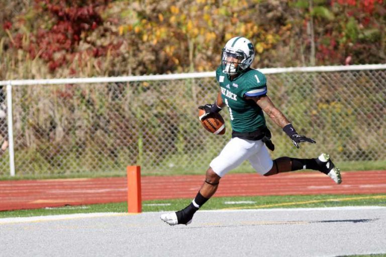 Rock football soars over Griffins - The Rocket